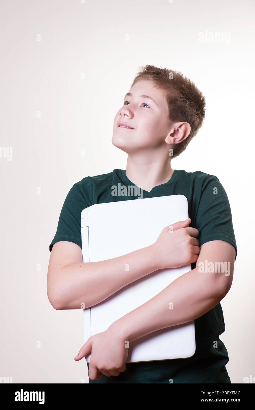 Cute school kid holding notebook hi-res stock photography and images ...