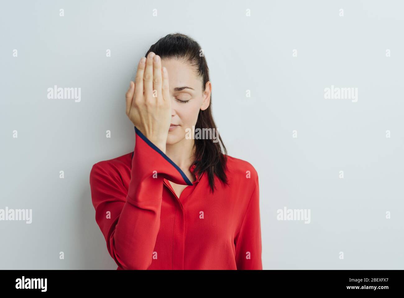 Woman with one eye closed hi-res stock photography and images - Alamy