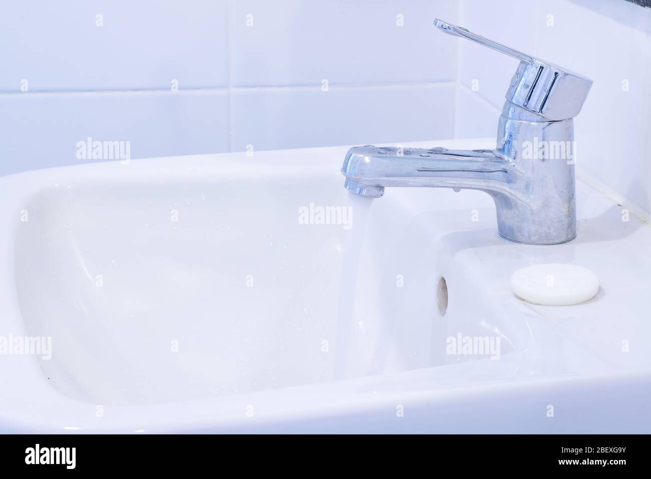 Wash basin tab hi-res stock photography and images - Alamy