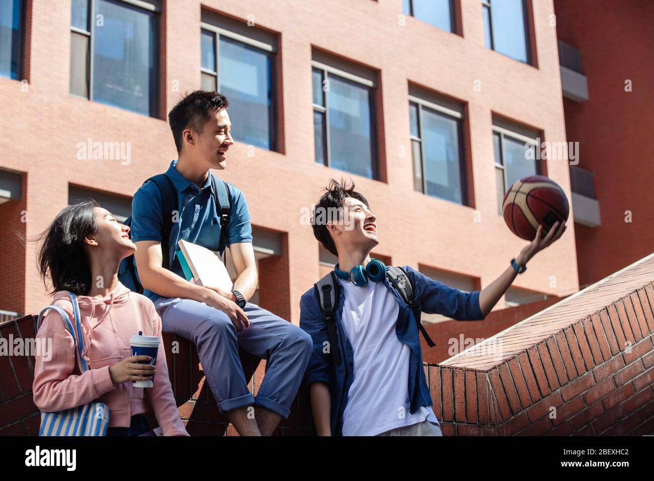 The first class of college students on campus gossip Stock Photo - Alamy