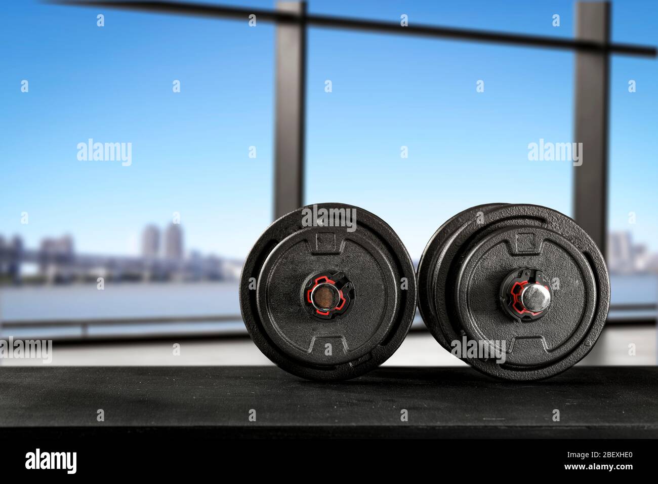 Dumbbells and weights in the gym. Workout and exercise concept and ...