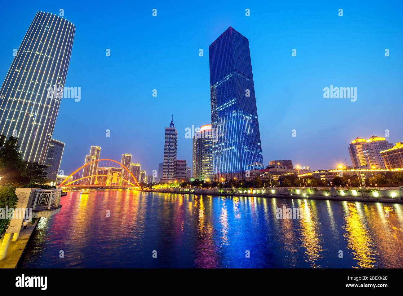 illuminated city waterfront downtown skyline with Haihe river,Tianjin ...
