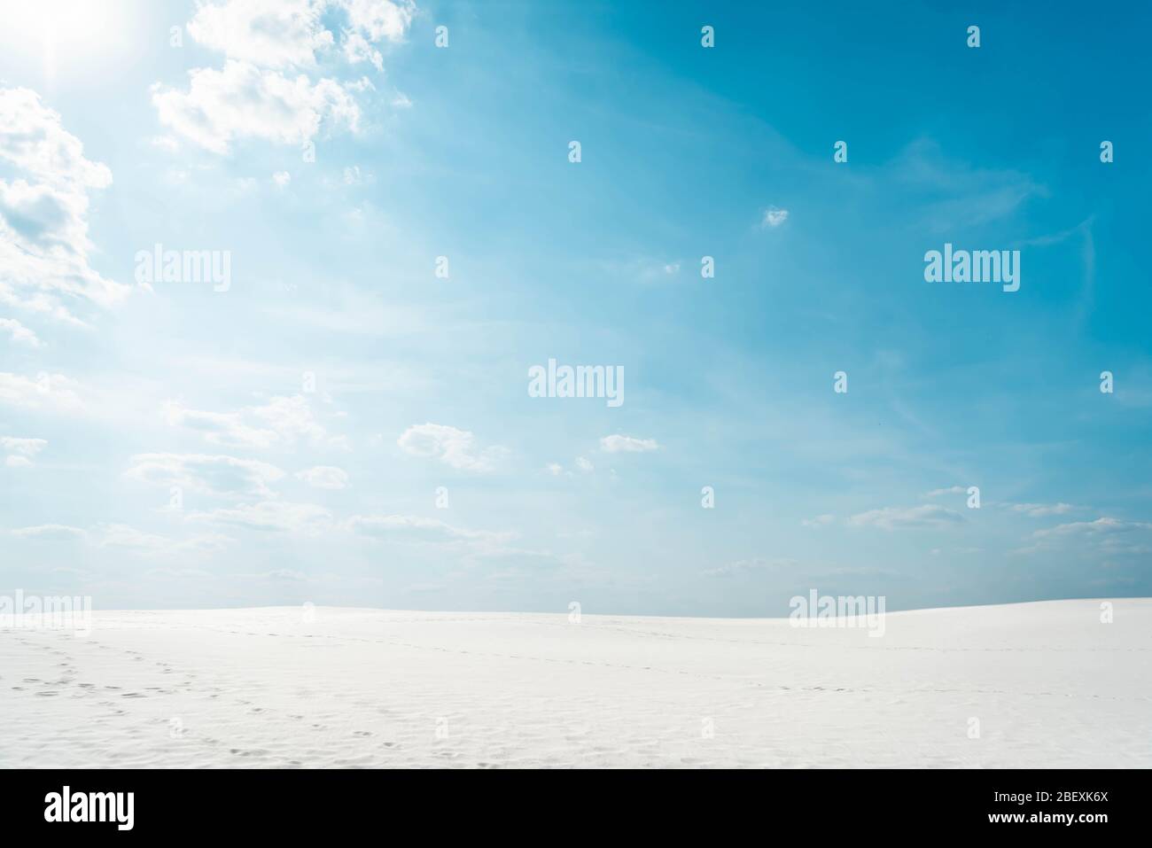 beautiful clean beach with white sand and blue sky with white clouds ...