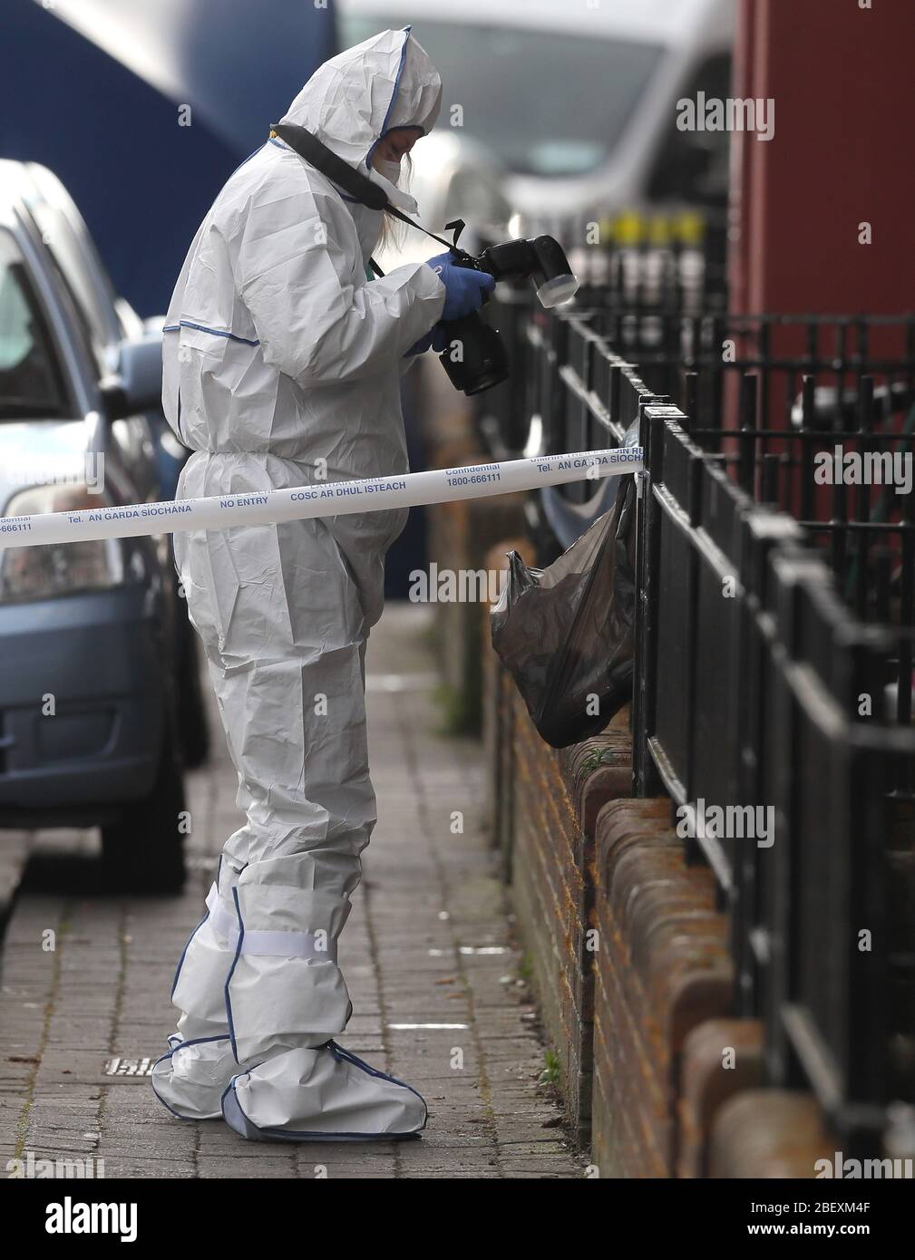 Forensic investigators at the Ballybough House flats complex, Dublin ...