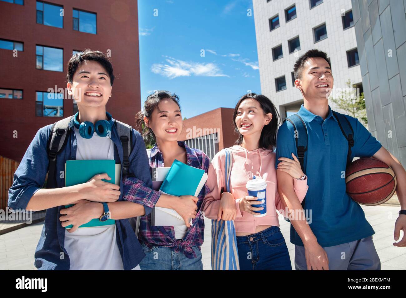 Two close college students on campus Stock Photo - Alamy