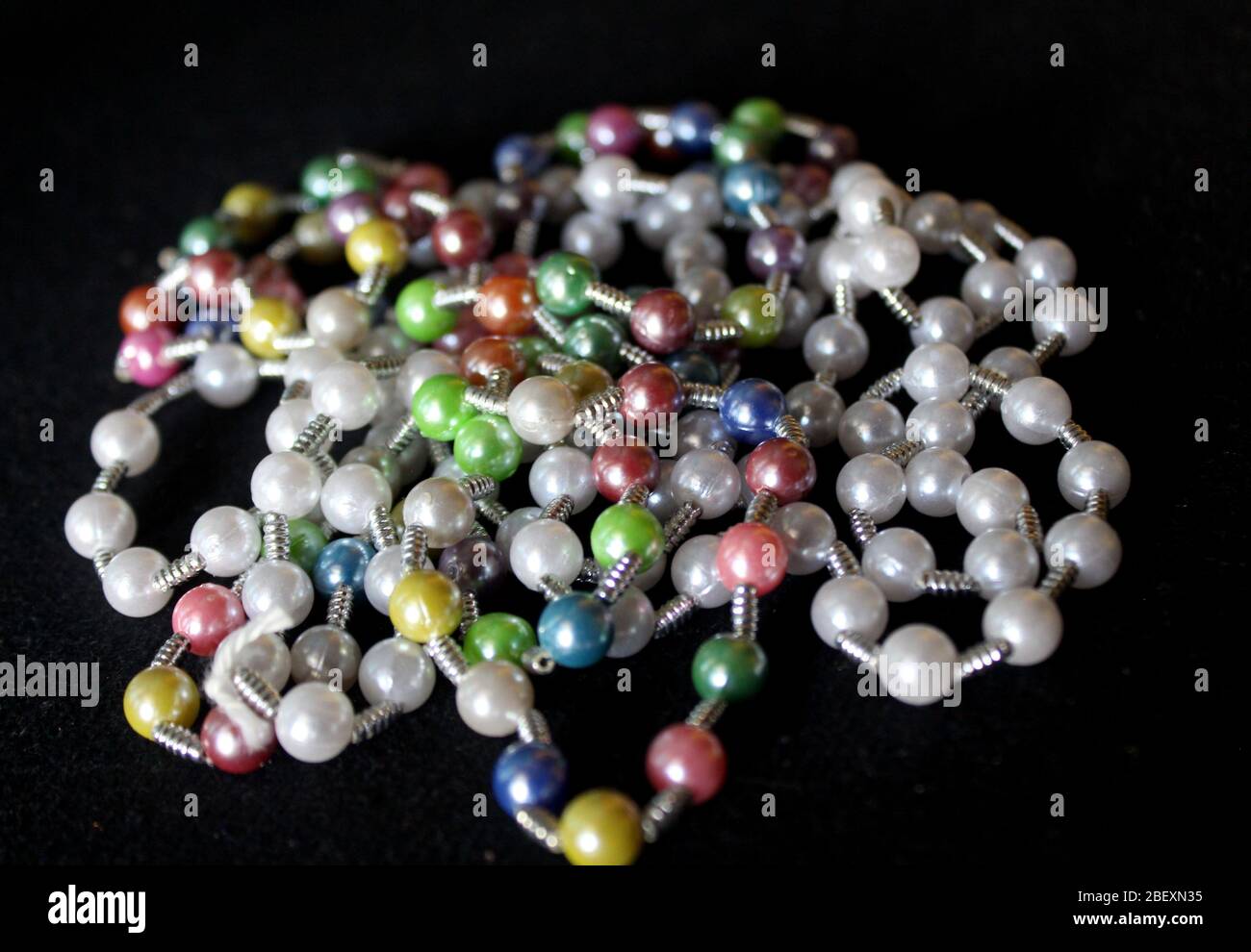 colorful Pearl strings abstract, background row of pearl ornaments on ...