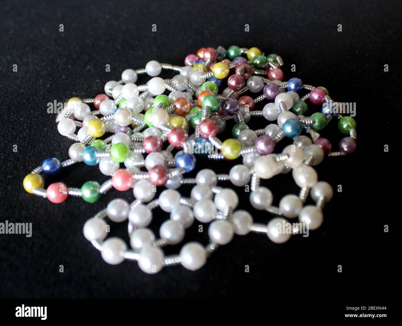 colorful Pearl strings abstract, background row of pearl ornaments on ...