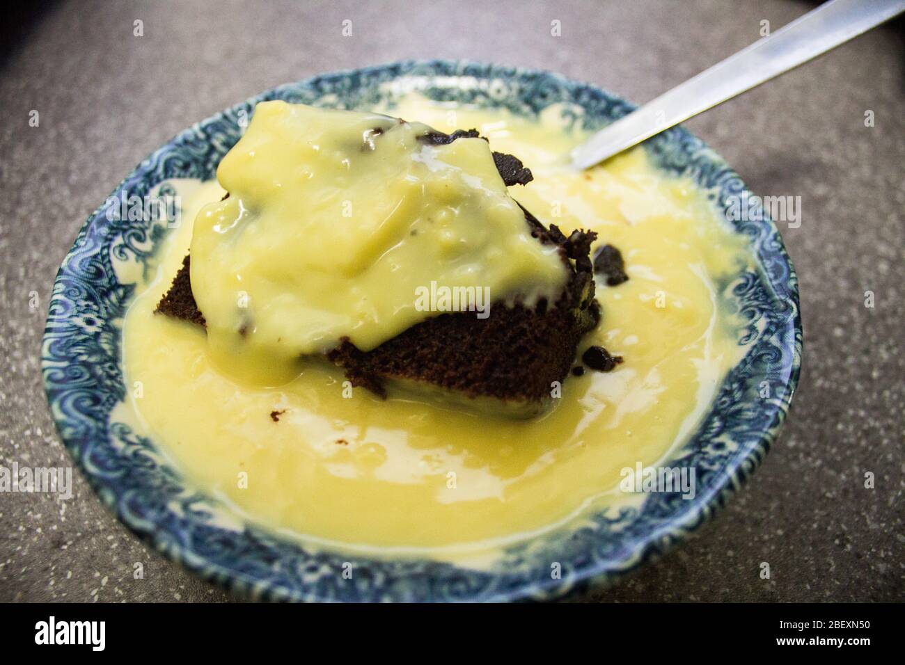Chocolate Cake and Custard Stock Photo - Alamy