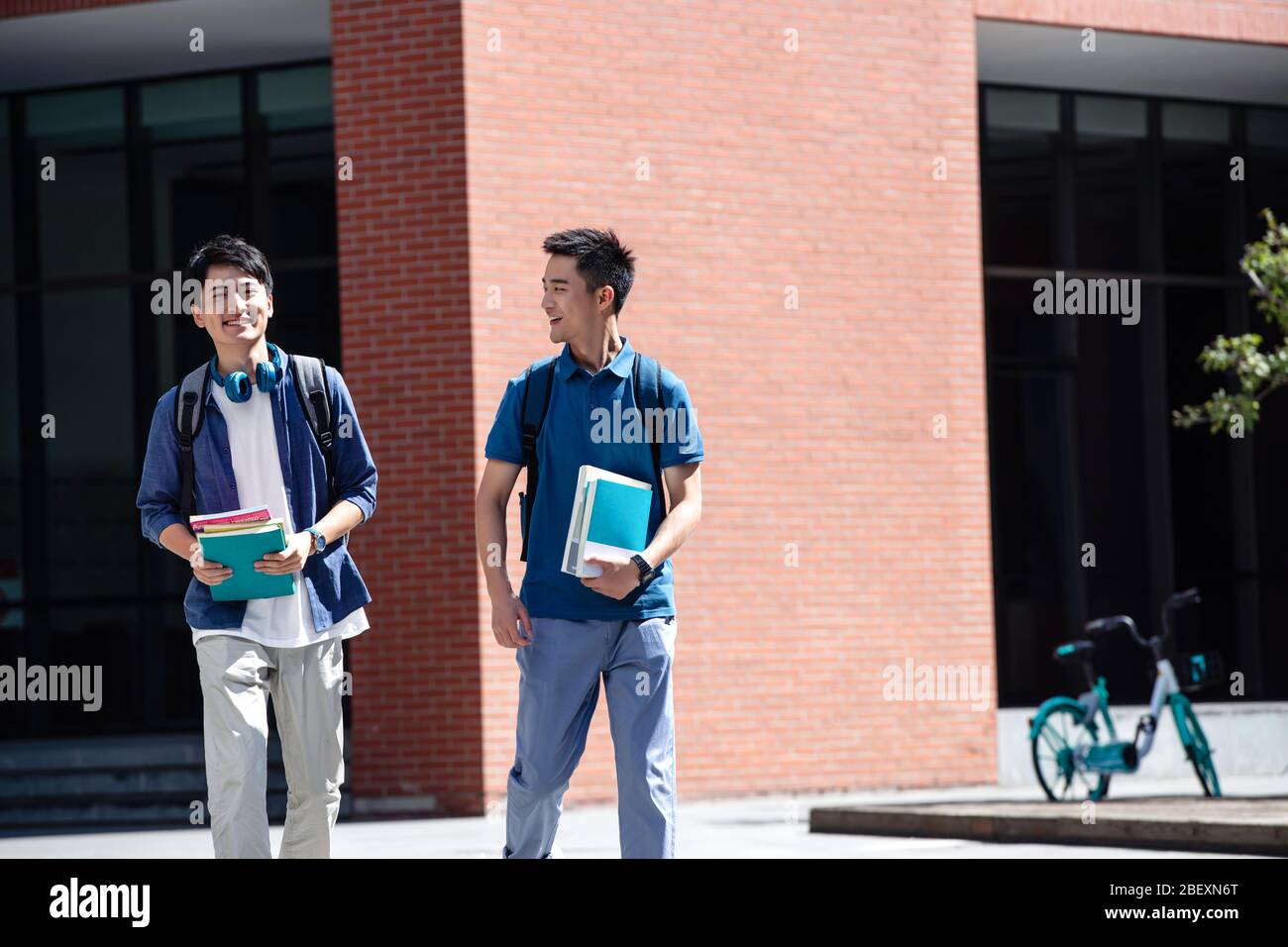 The young man on campus just class is over Stock Photo - Alamy