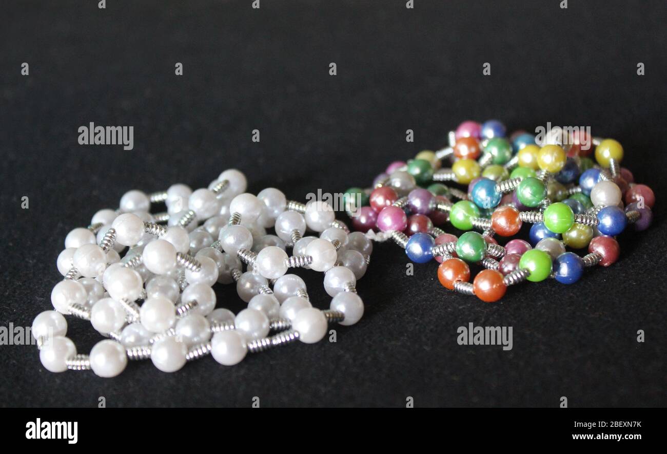 colorful Pearl strings abstract, background row of pearl ornaments on ...