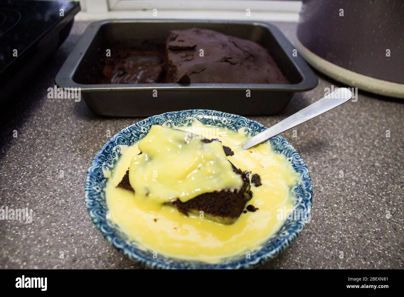 Chocolate Cake and Custard Stock Photo - Alamy
