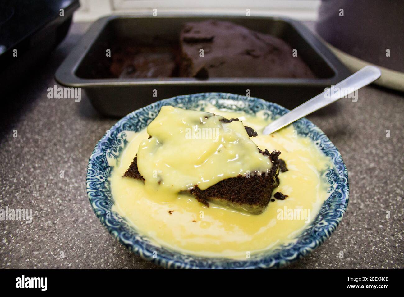 Chocolate Cake and Custard Stock Photo - Alamy