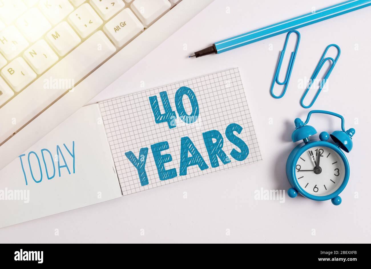 Writing note showing 40 Years. Business concept for Remembering or ...