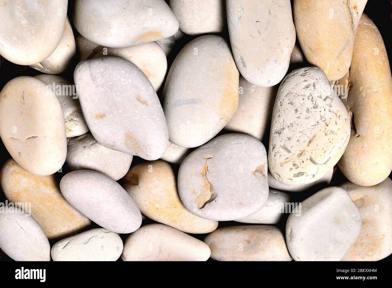 gray rounded stones of heterogeneous structure, background Stock Photo ...