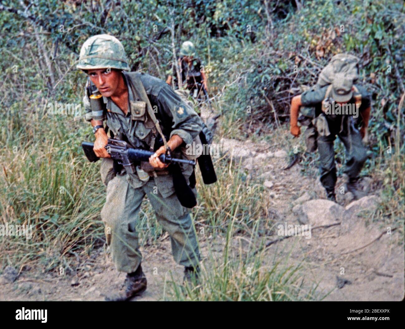 Members of the Long Range Reconnaissance Team Moving through Rough ...