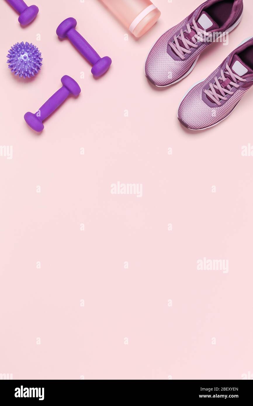 Sports equipment for women's training in pastel colored. Pink ...