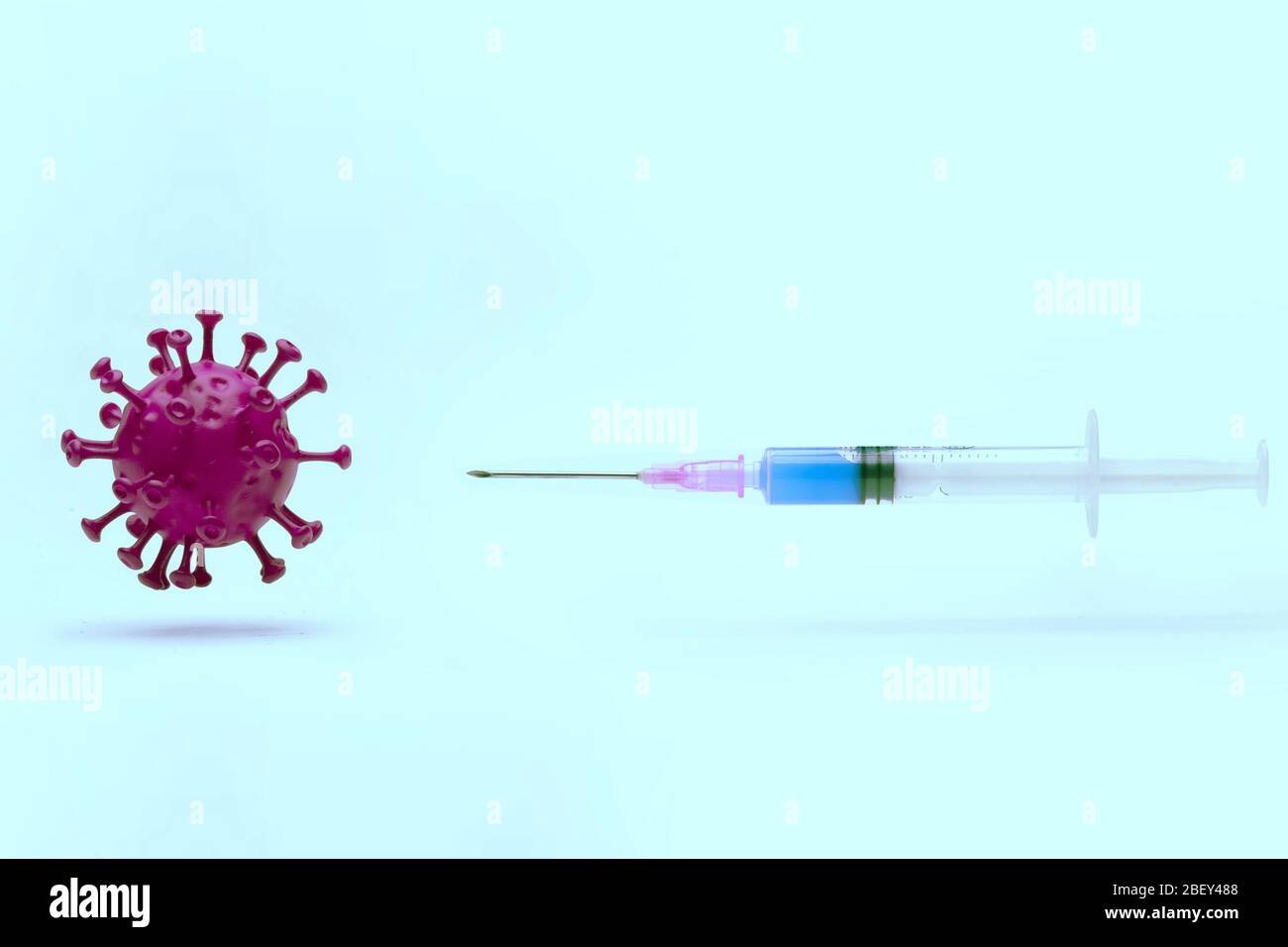Syringes and virus Stock Photo - Alamy