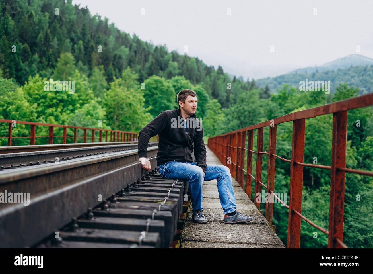 Man on train track hi-res stock photography and images - Alamy