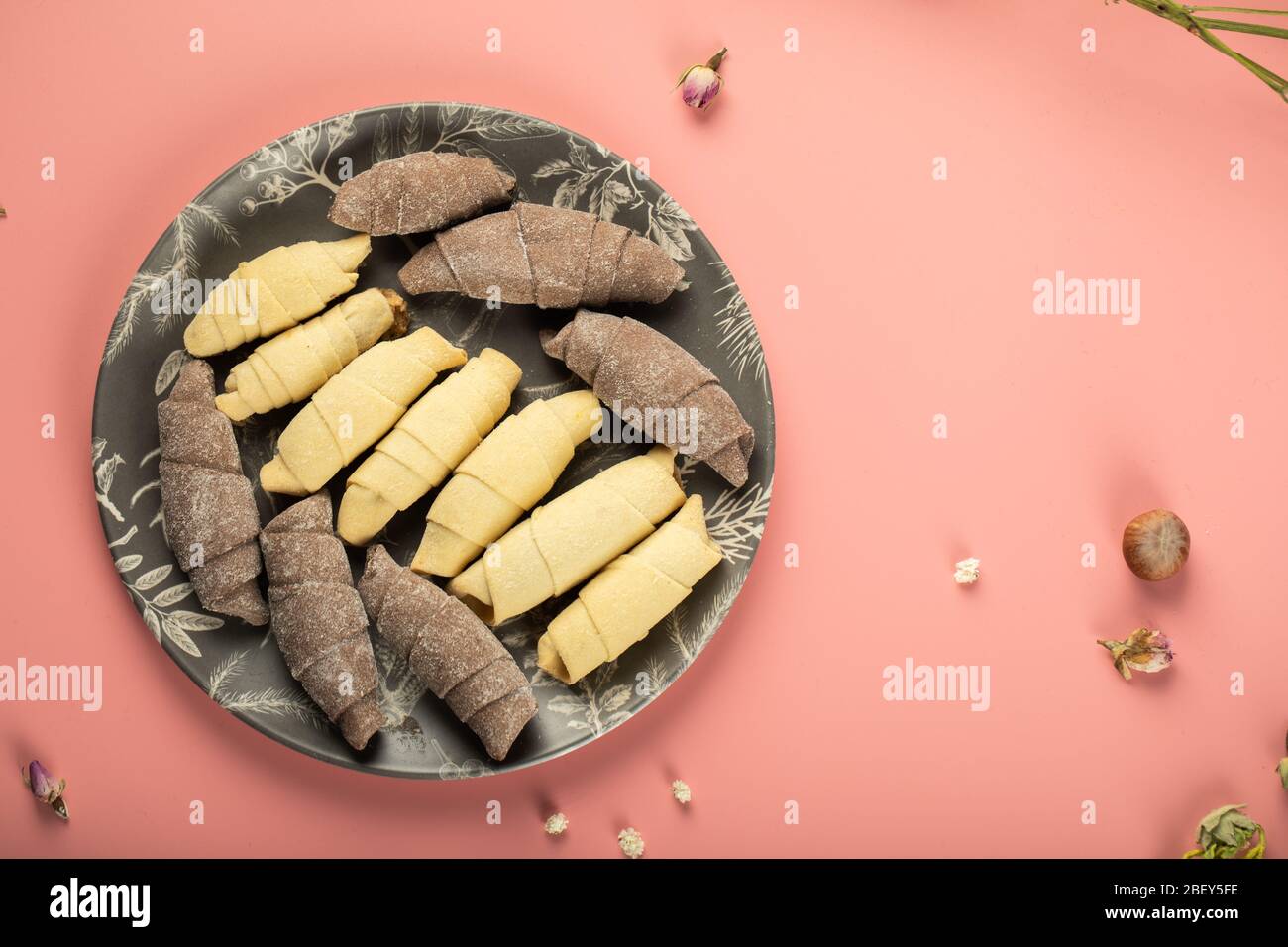 Caucasian sweets mutaki made with vanilla and cocoa dough in a black ...