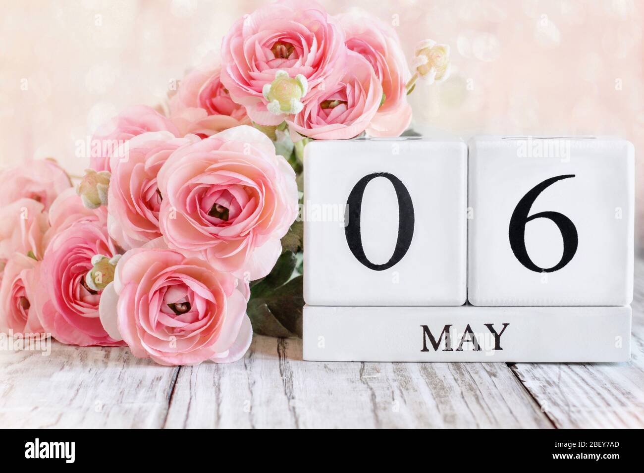 Generic white wood calendar blocks with the date May 6th. Selective ...