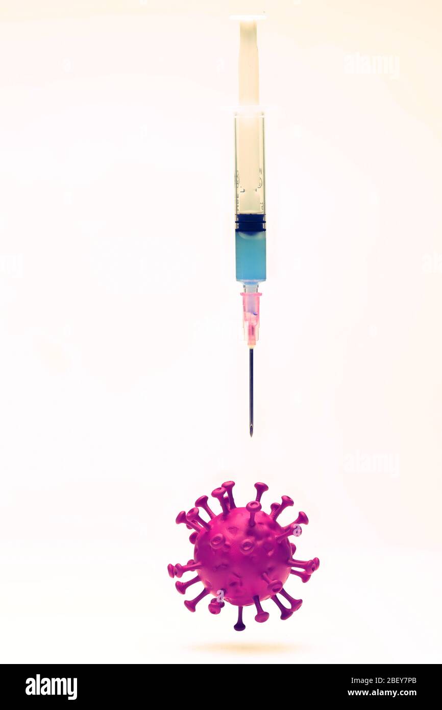 Syringes and virus Stock Photo - Alamy