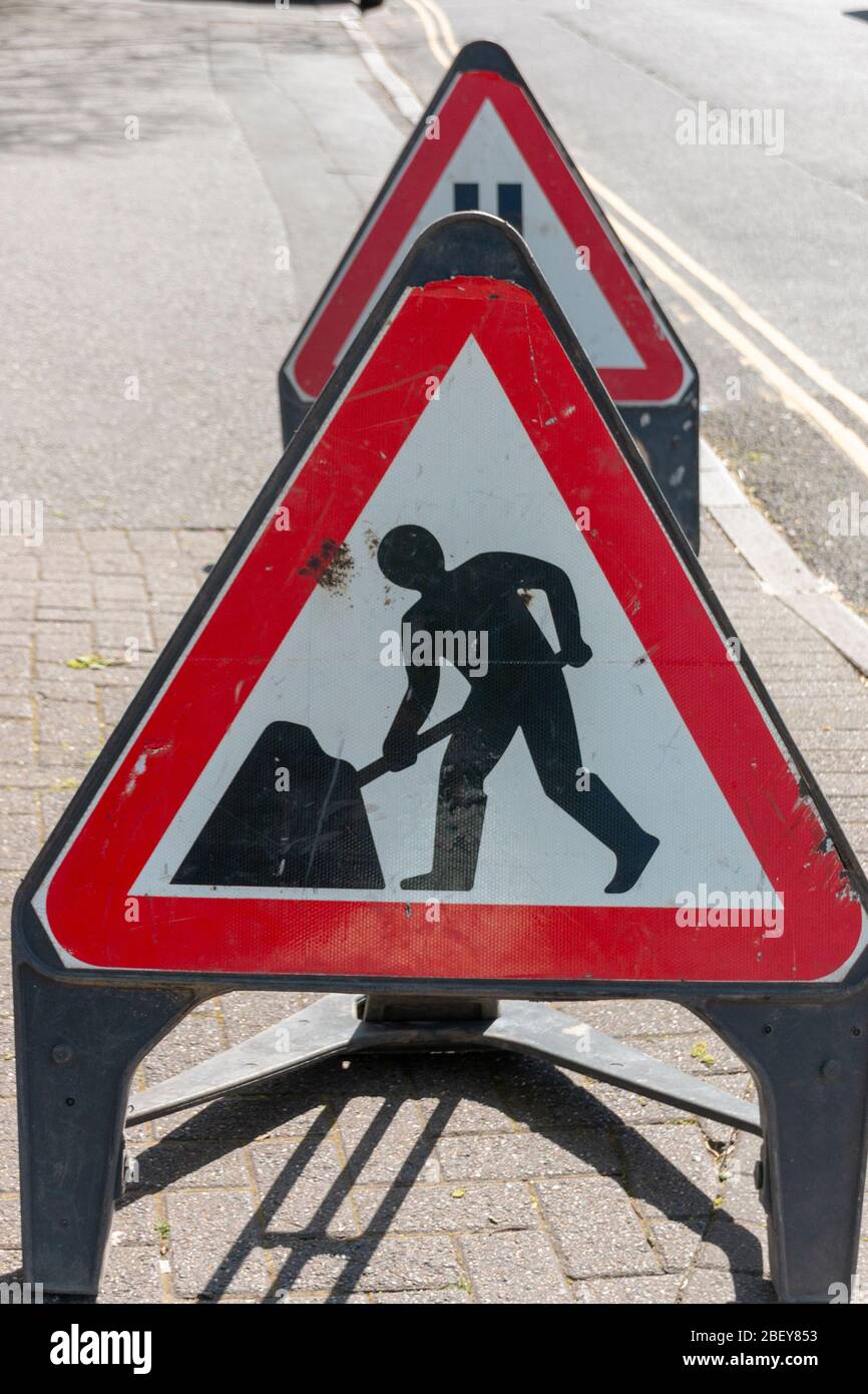 Men at work road signs hi-res stock photography and images - Alamy
