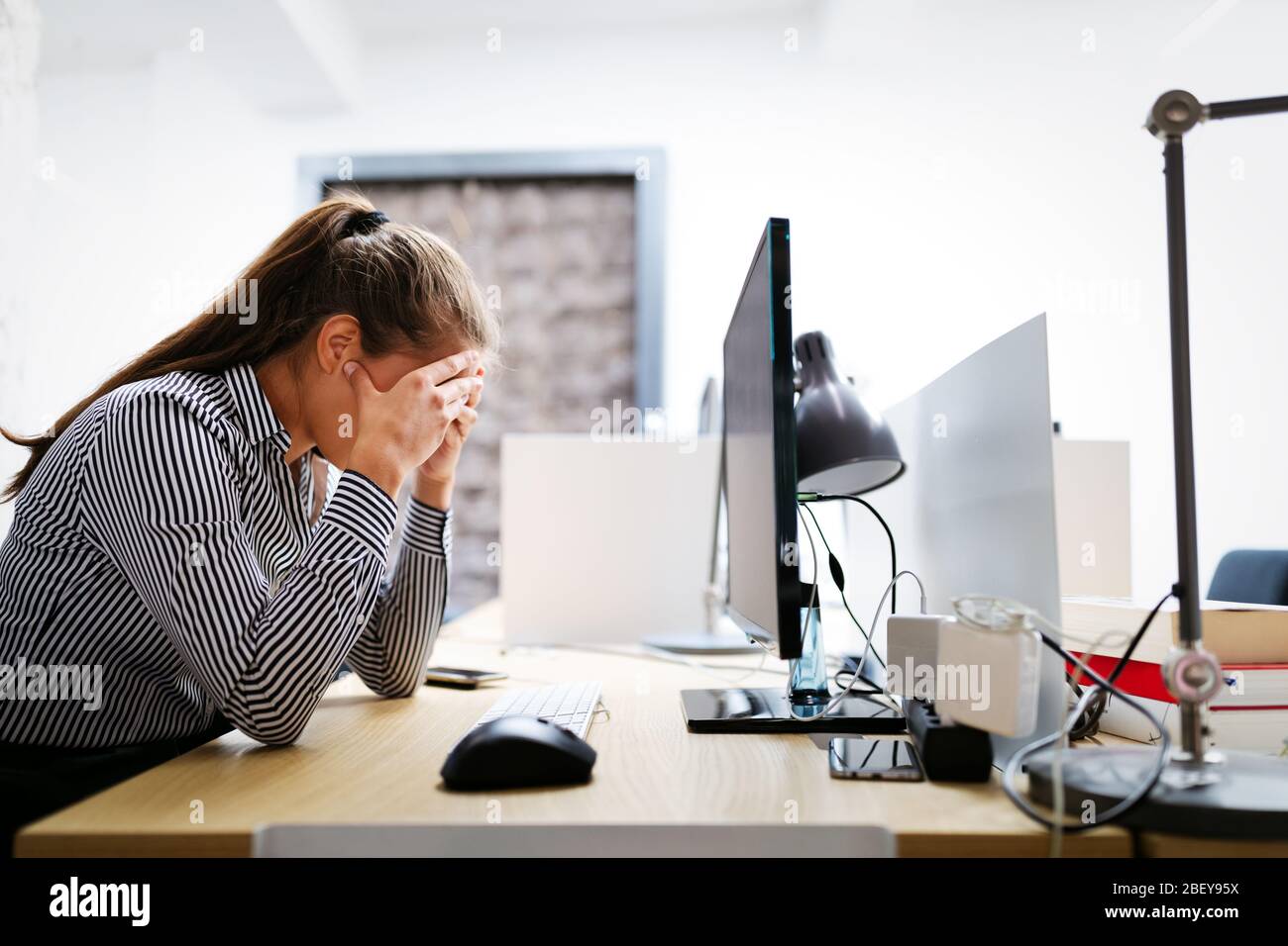 Overworked secretary in office hi-res stock photography and images - Alamy
