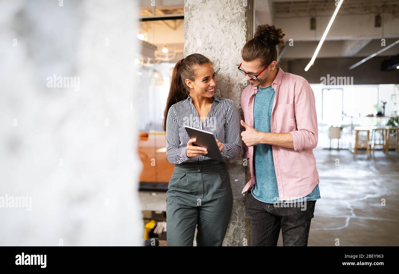 Two People Standing Talking