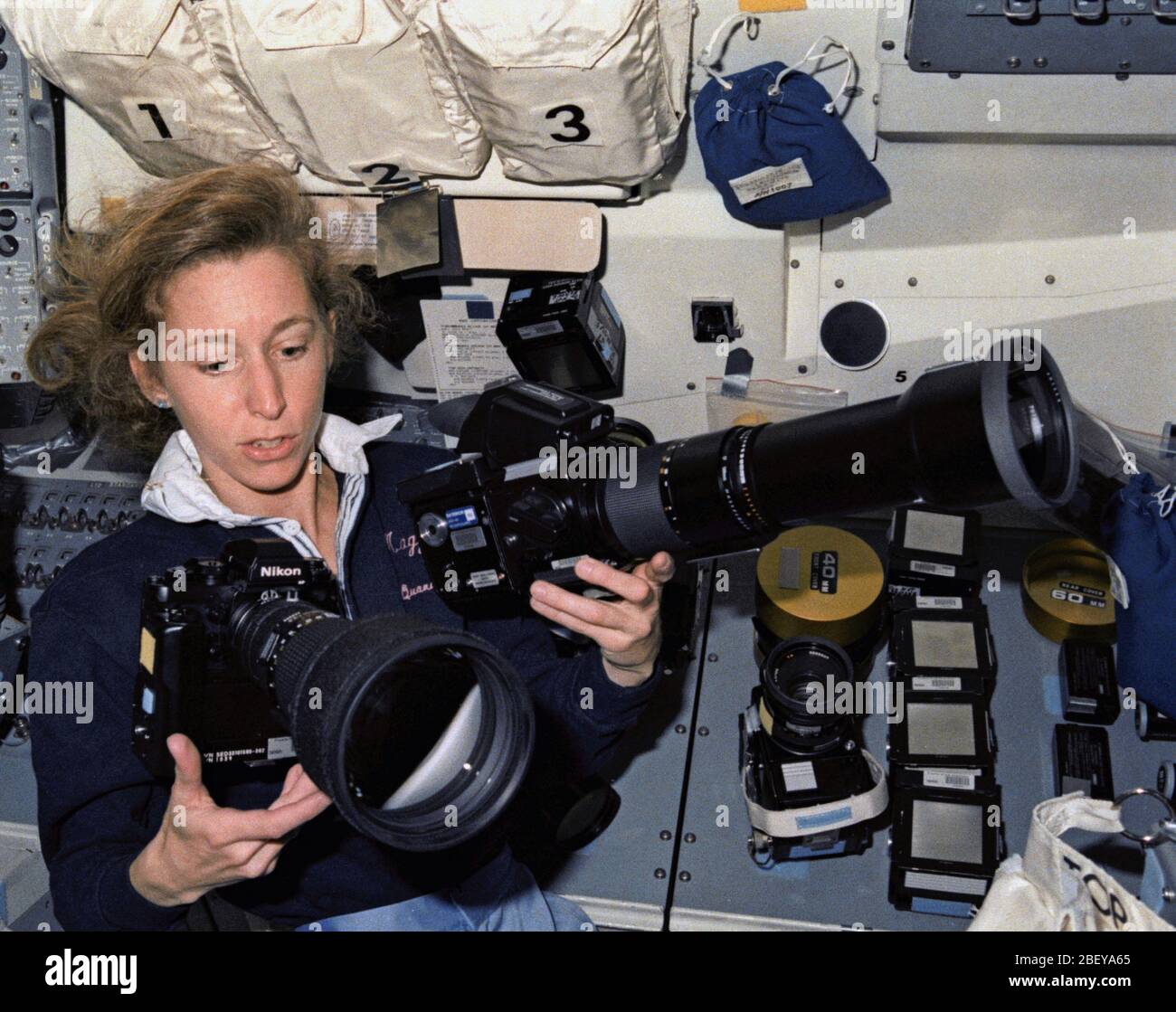 (9-20 Jan 1990) --- A 35mm scene of Astronaut Marsha Ivins with 35mm ...