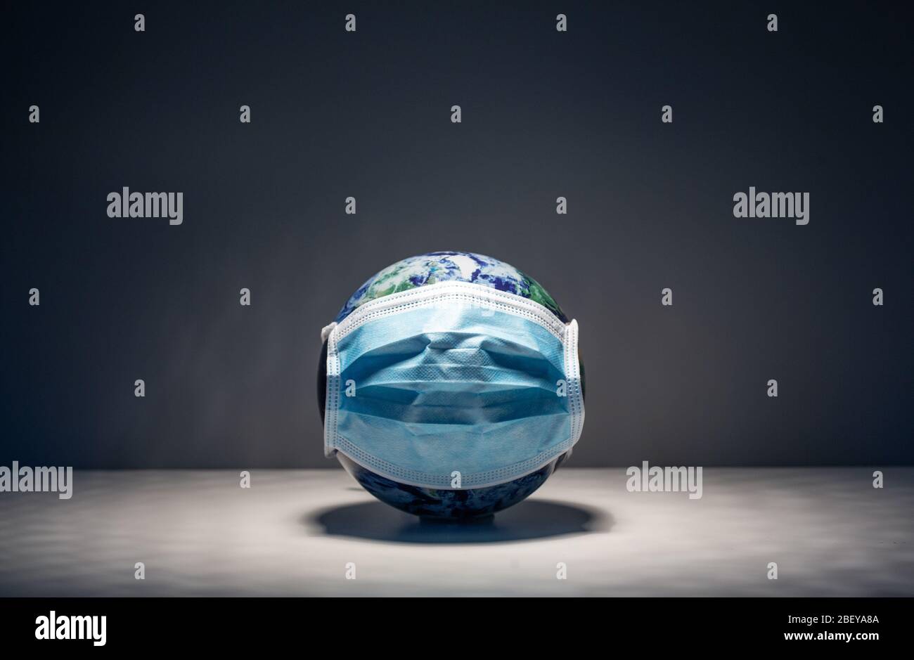 The earth is wearing a face mask Stock Photo - Alamy