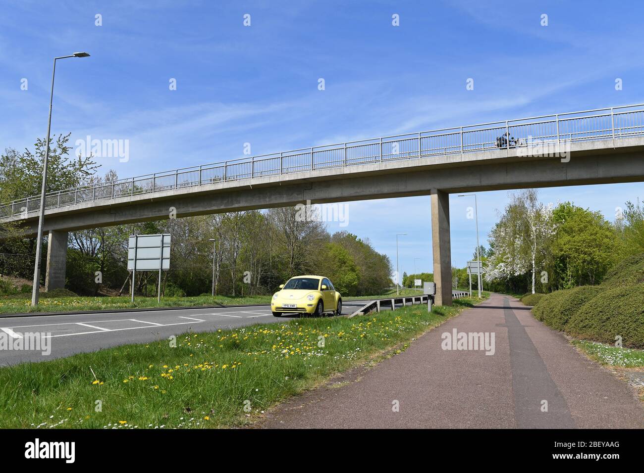 Bridge over dual carriageway Stock Photo - Alamy