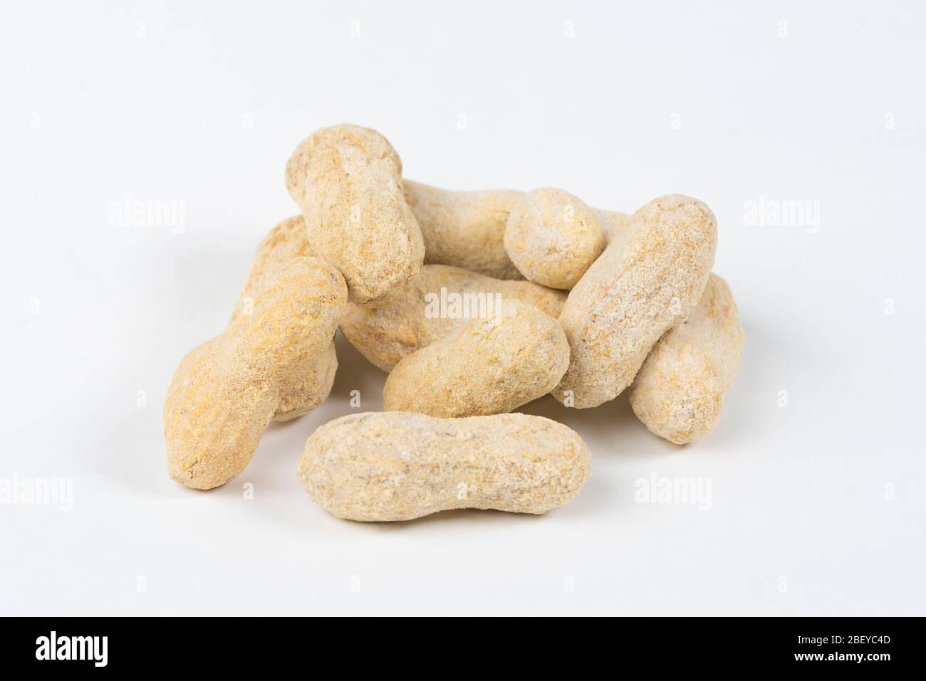 Shelled salted peanuts in shell on white background Stock Photo - Alamy