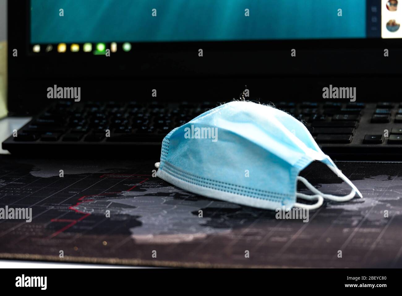 Mask Computer workplace background Stock Photo - Alamy