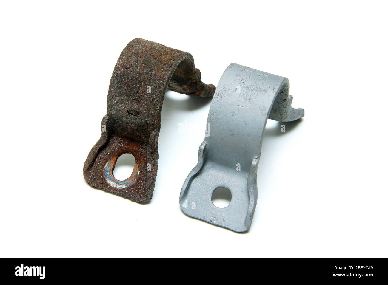 The overgrown rusty cast iron part compared with the same sand blasted ...