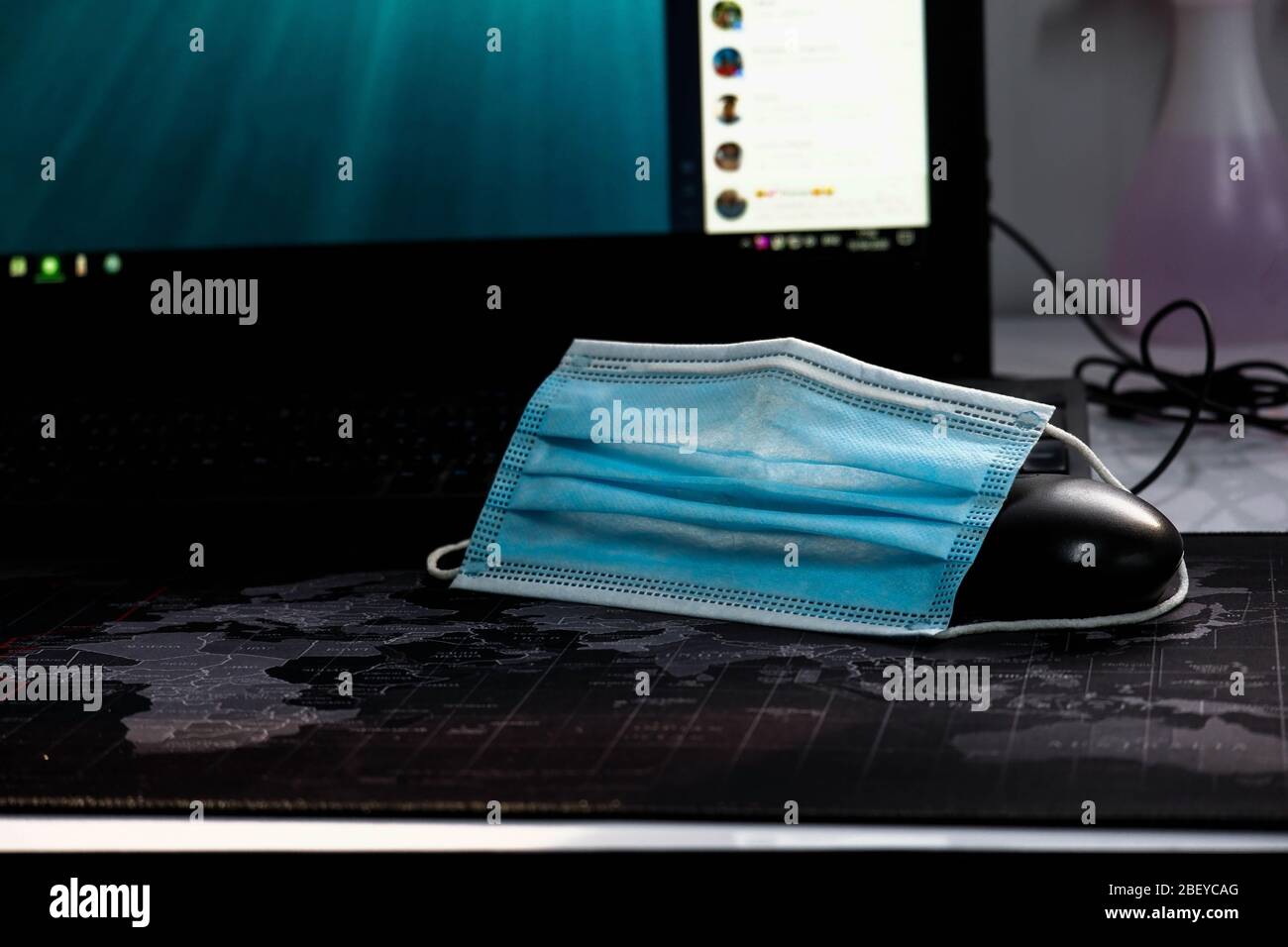 Mask Computer workplace background Stock Photo - Alamy