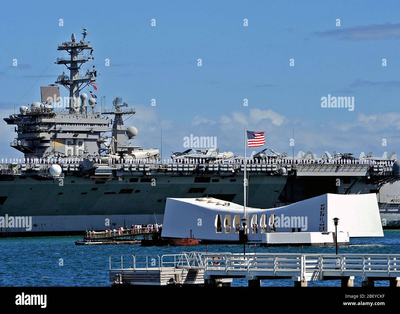 (July 2, 2012) Sailors man the rails aboard the aircraft carrier USS ...