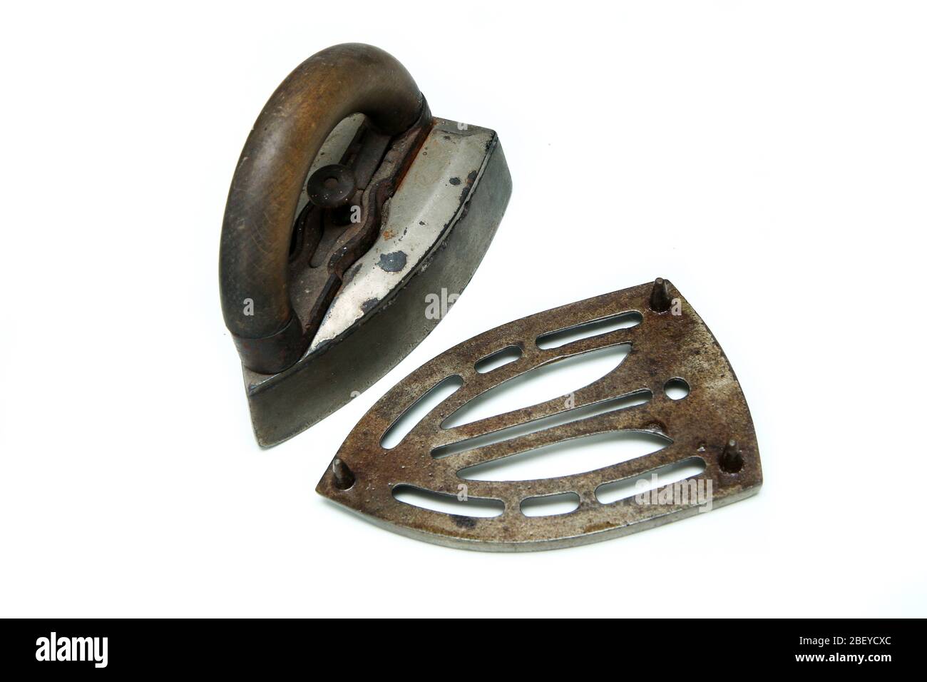 The old retro or vintage iron isolated in a white background Stock ...