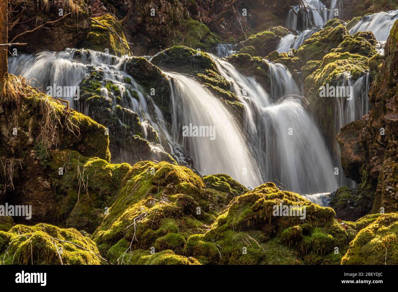 Water flowing over rocks covered in moss, Voje valley Stock Photo - Alamy