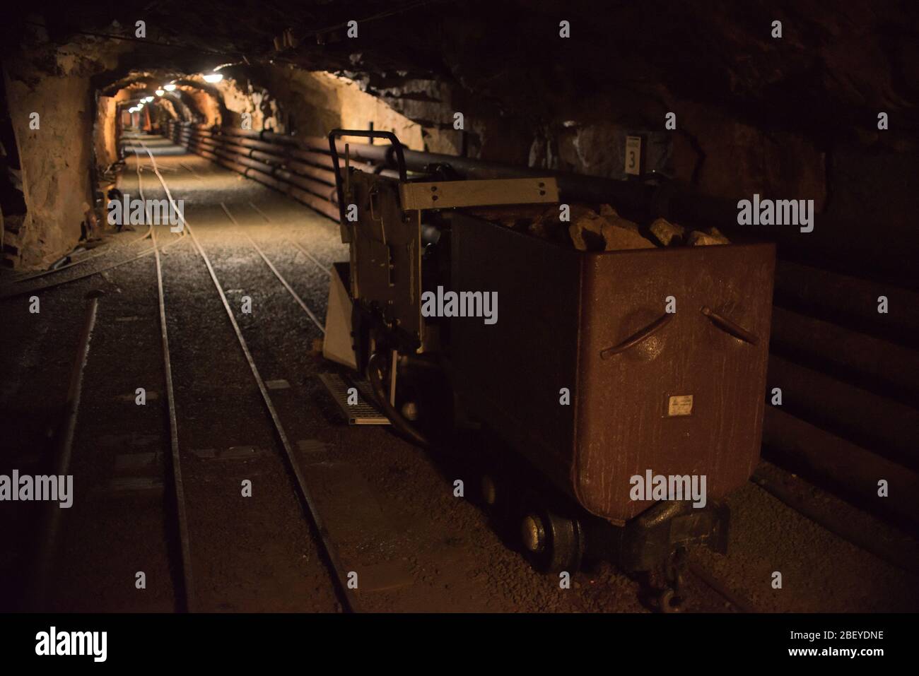old mining carts with wheels on rail for the transportation of minerals ...
