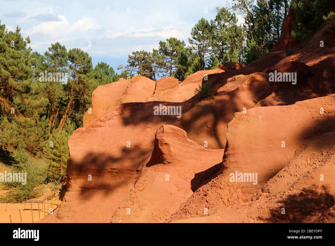 The nice yellow and red sandstone rocks by Roussillon in France. The ...