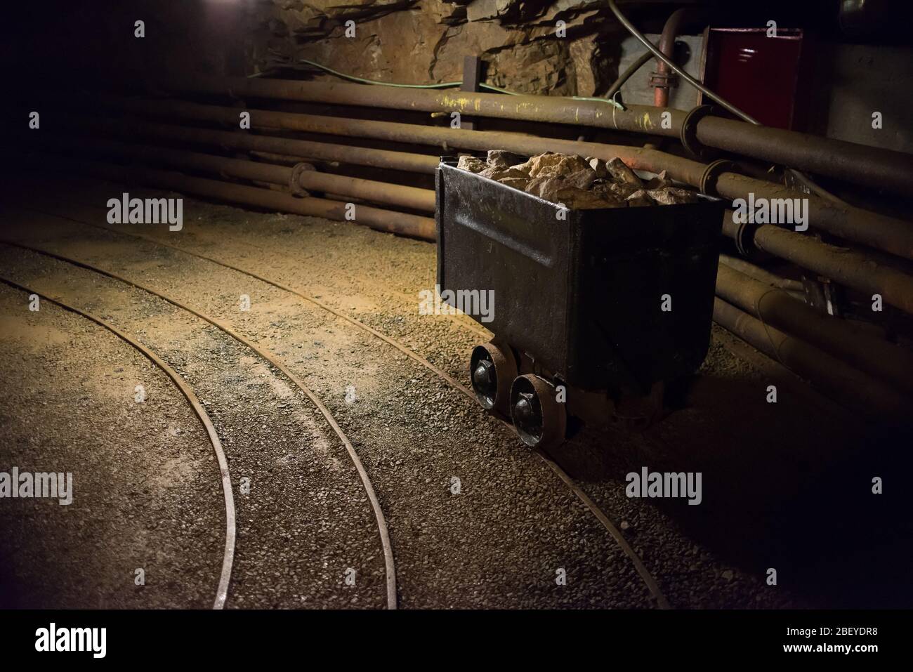 old mining carts with wheels on rail for the transportation of minerals ...