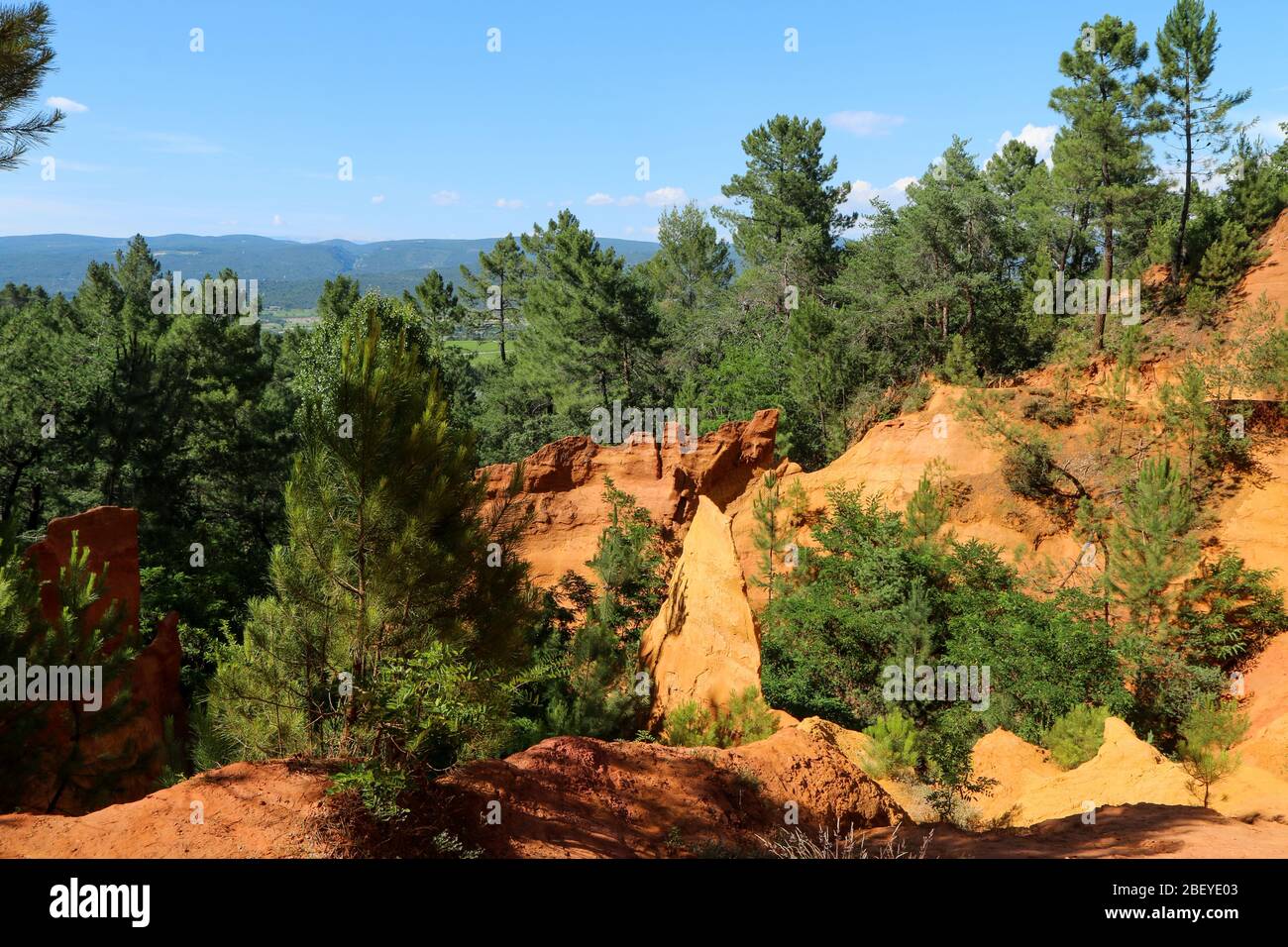 The nice yellow and red sandstone rocks by Roussillon in France. The ...