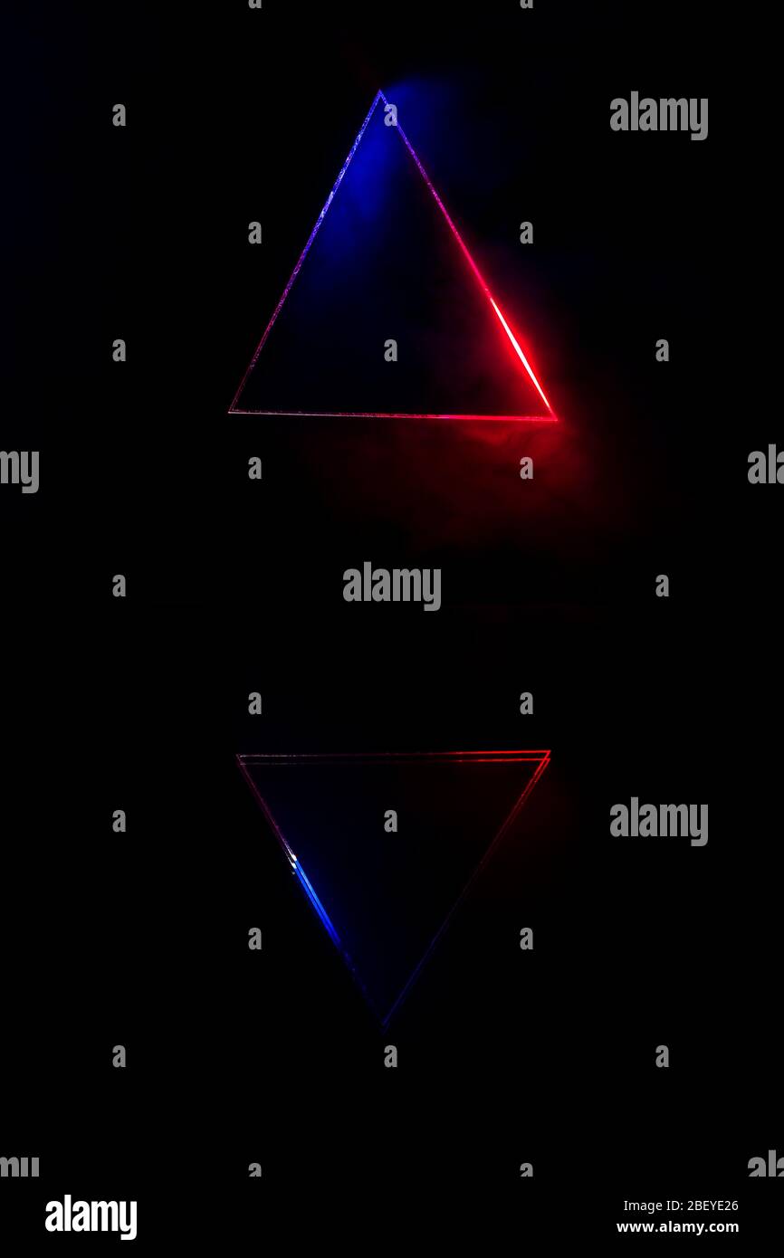 Lighting and smoke through the triangle and reflective Stock Photo - Alamy