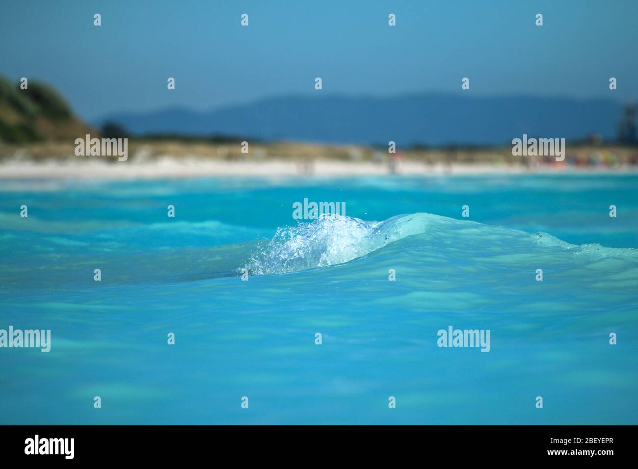 The detail of the sea wave in Rosignano in Italy. Famous white beach ...