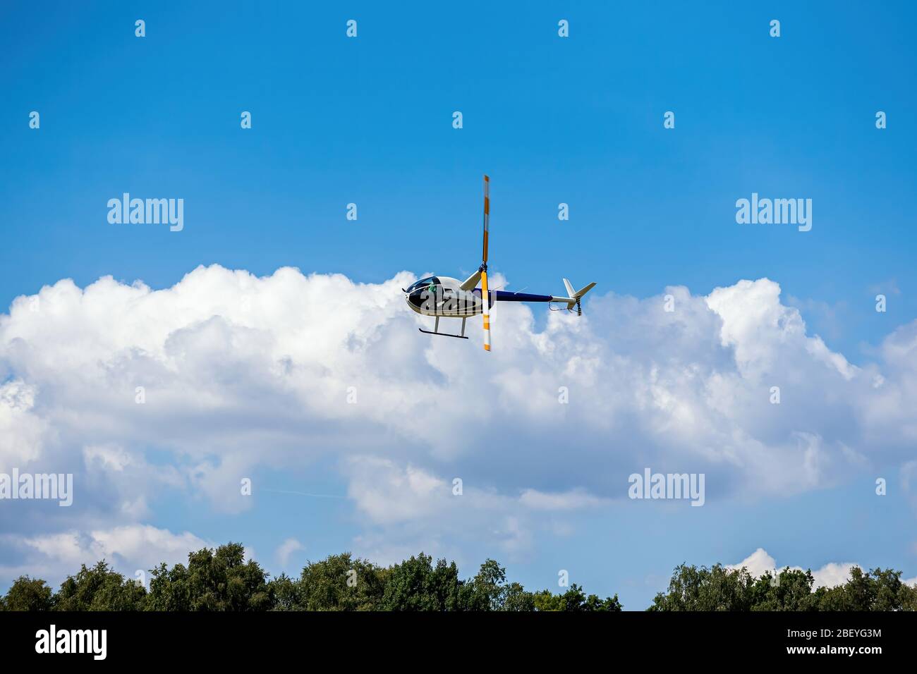 passenger helicopter flies at an air show Stock Photo - Alamy
