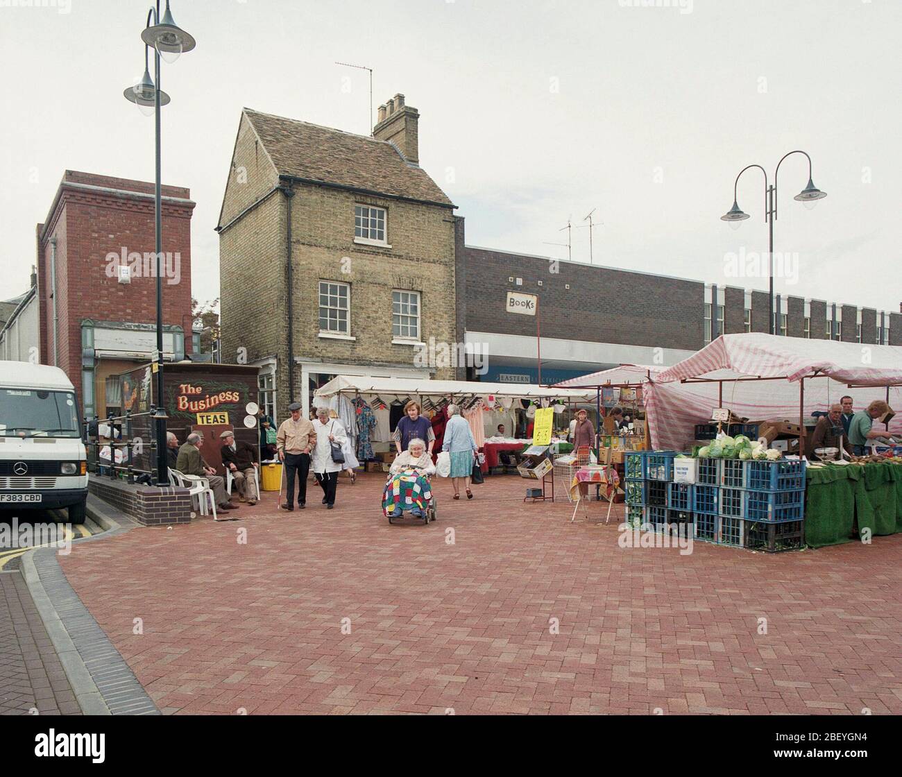 1992, Ely town Centre, and market place, east England, UK with people ...