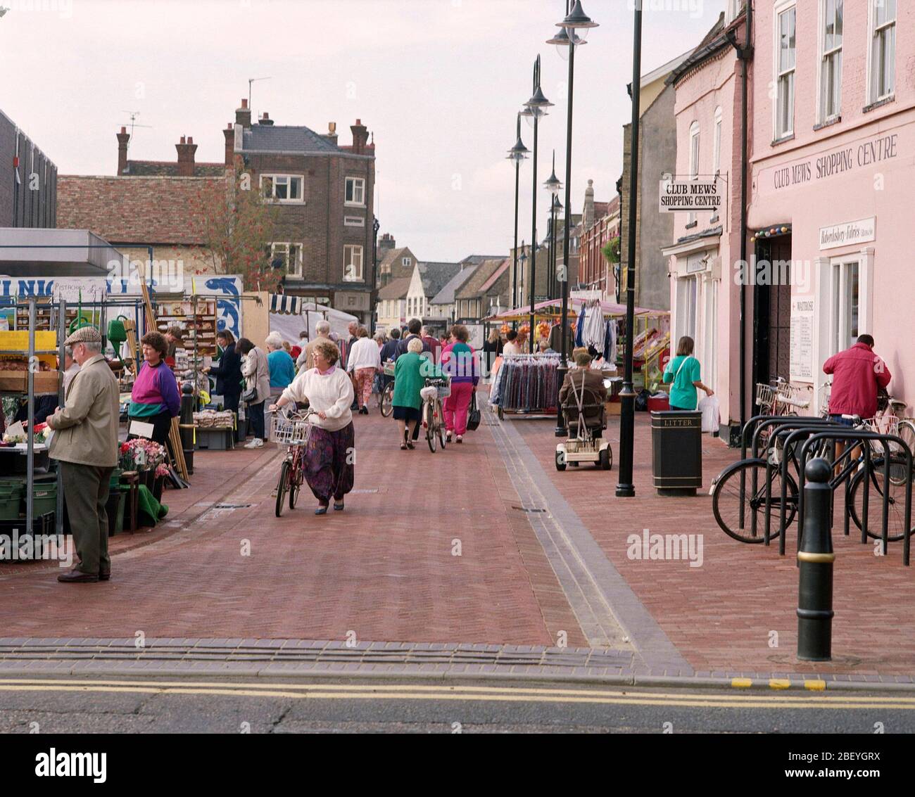 1992, Ely town Centre, and market place, east England, UK with people ...