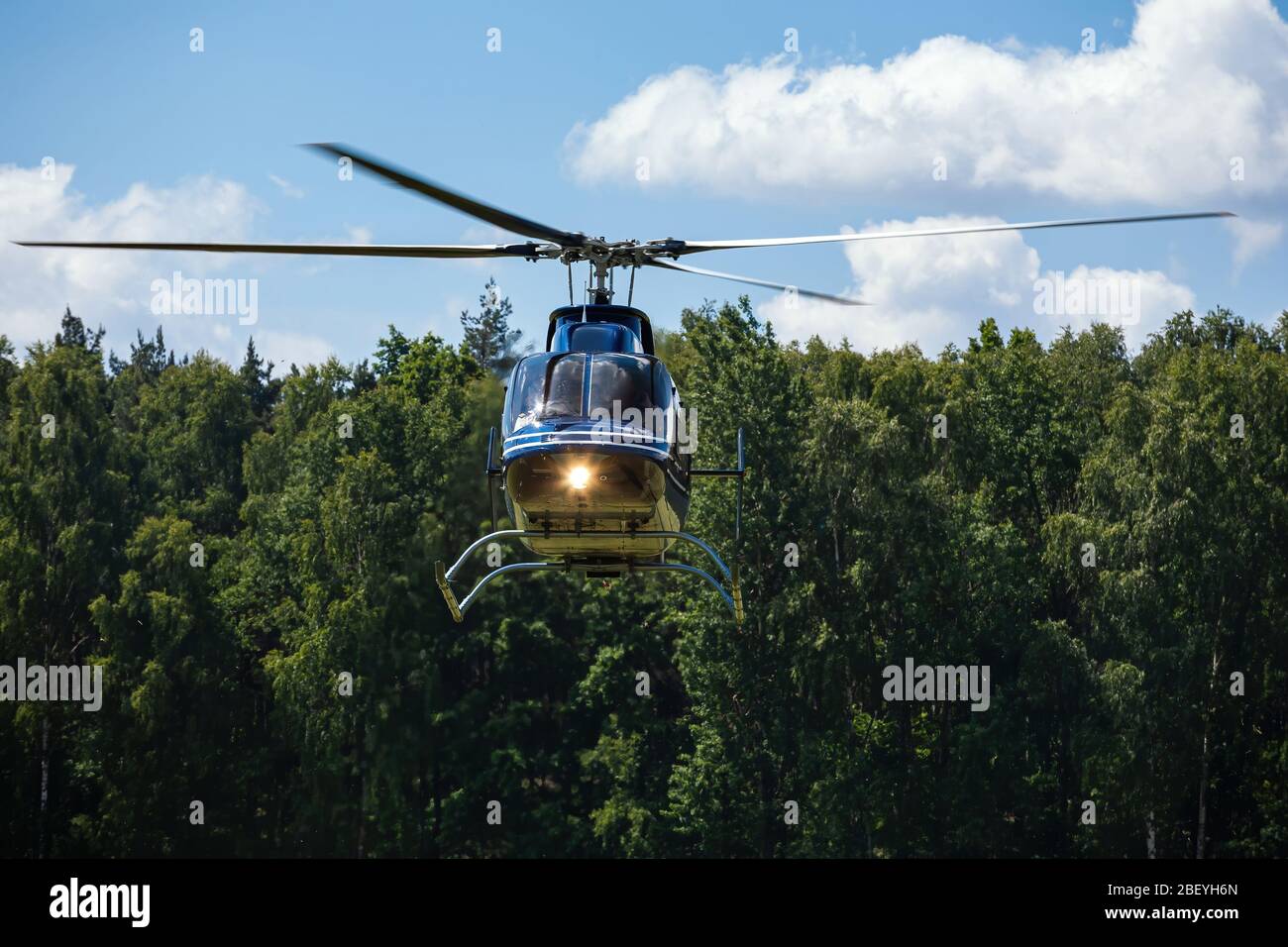 passenger helicopter flies at an air show Stock Photo - Alamy