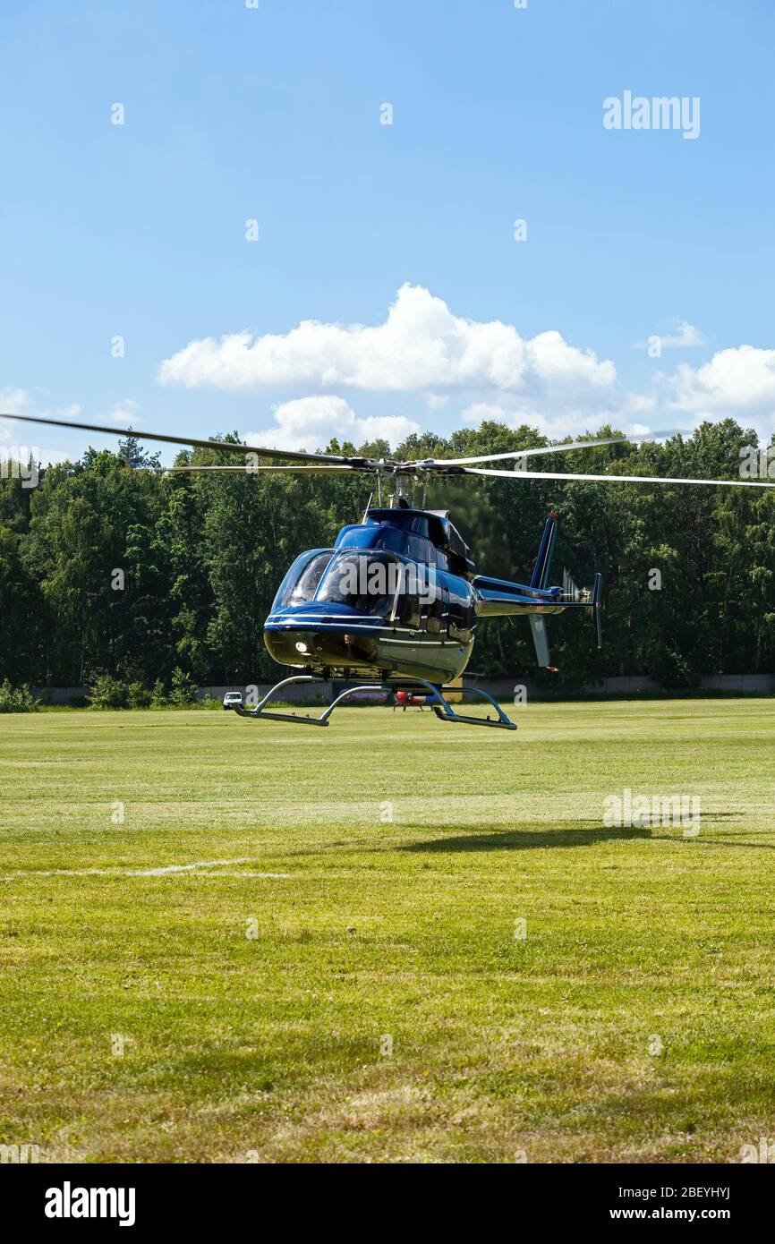 passenger helicopter flies at an air show Stock Photo - Alamy