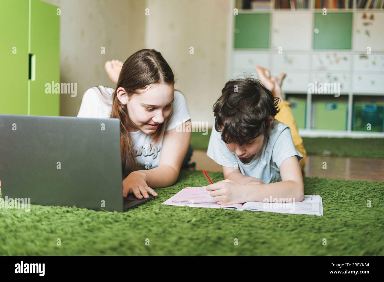 Siblings brother sister attractive girl teenager and tween boy do ...